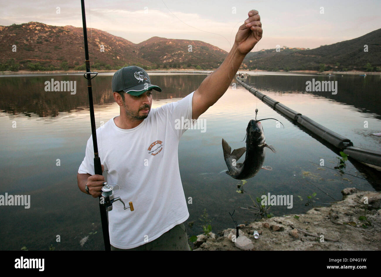 Aug 11, 2006; Poway, CA, USA; At dusk Imperial Beach resident EDWARD ...