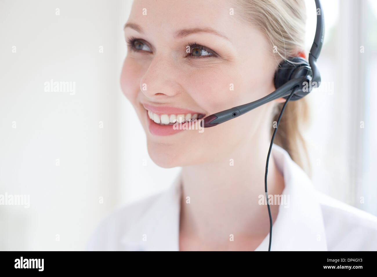 Person wearing headset hi-res stock photography and images - Alamy