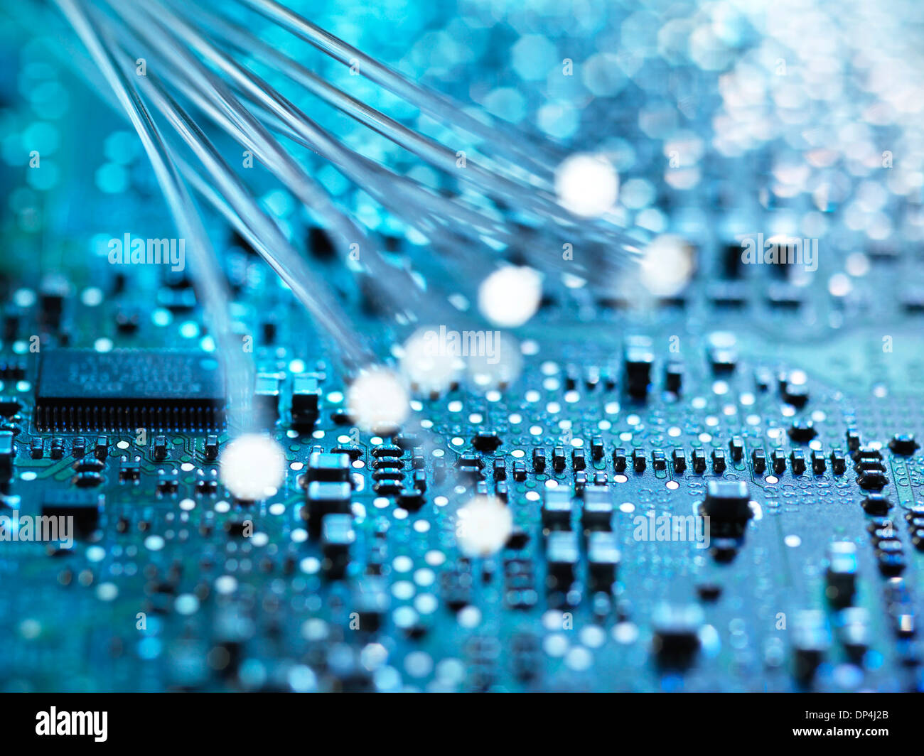Fibre optics and circuit board Stock Photo - Alamy