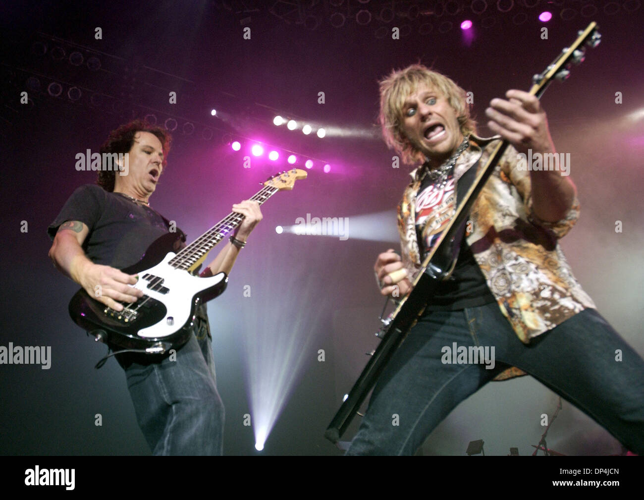 Aug 15, 2006; Raleigh, NC, USA; Guitarist CC DEVILLE (R) and bass ...