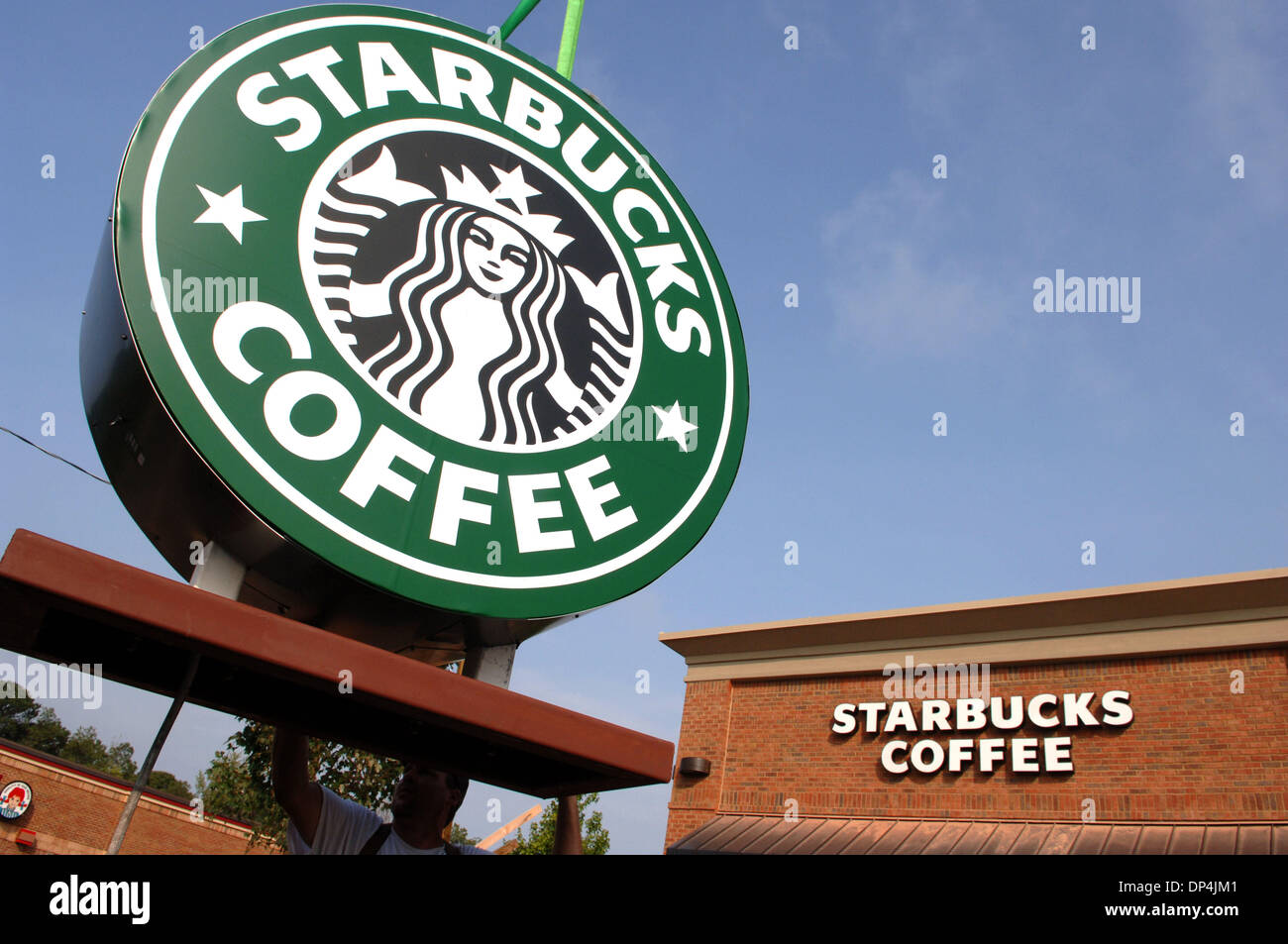 Aug 15, 2006; Kennesaw, GA, USA; A new Starbucks Coffee sign is erected ...