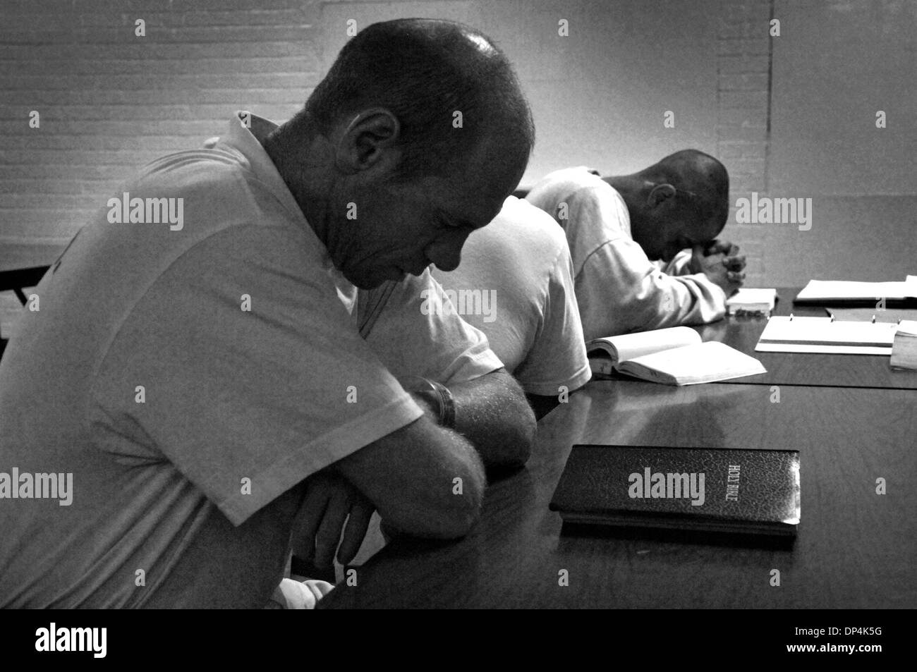 Inmates prison pray hi-res stock photography and images - Alamy