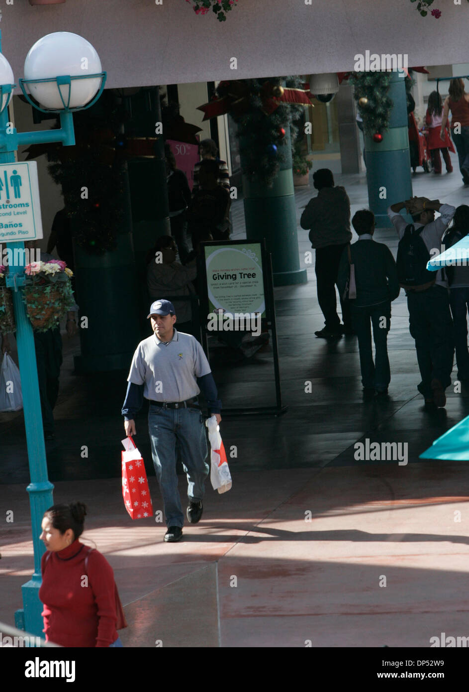 (Published 12/21/2005, C-4) Fernando Romero of Chula Vista, carrying ...