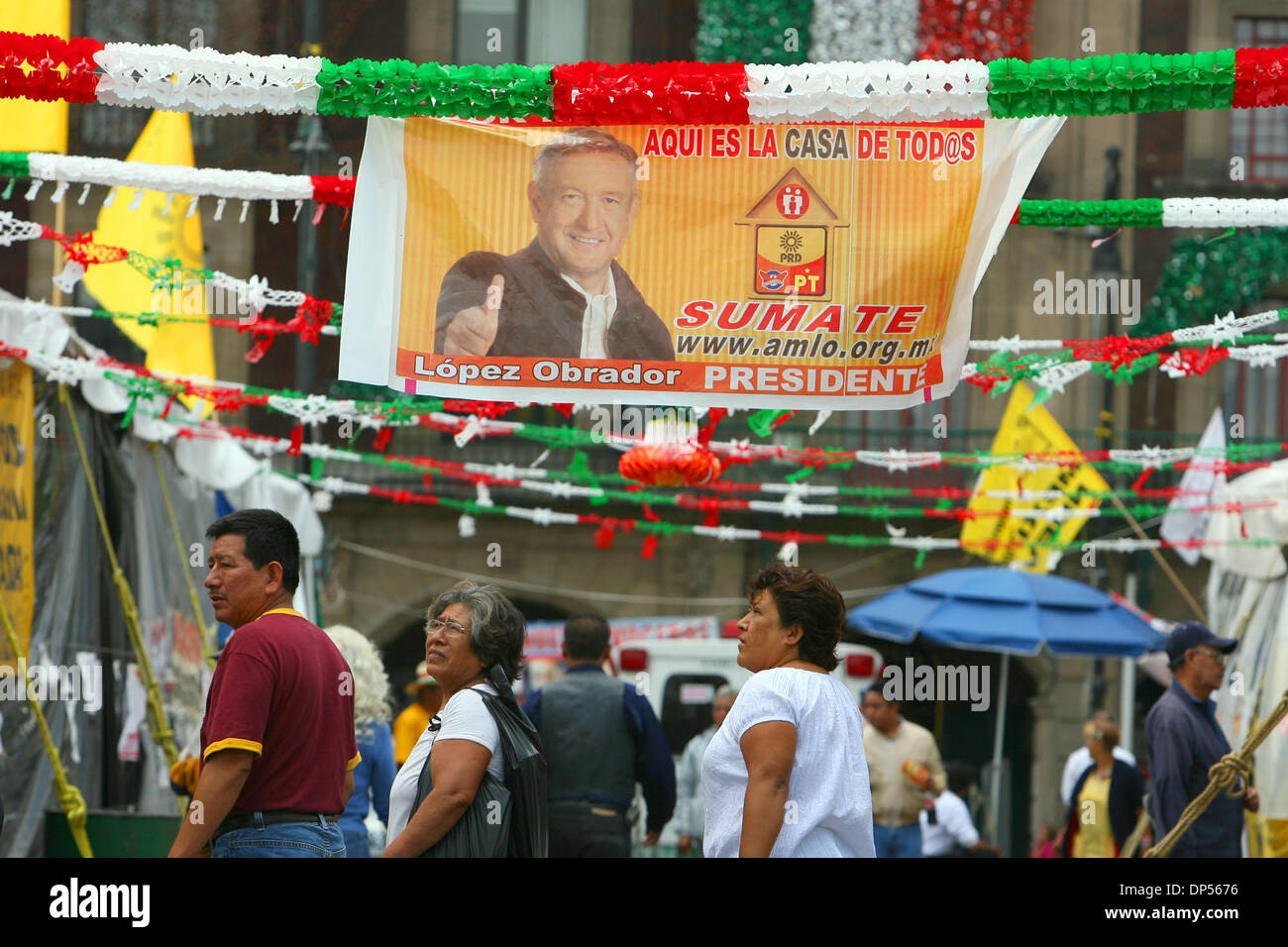 Sep 04, 2006; Mexico City, MEXICO; Pedestrians look at signs for ...