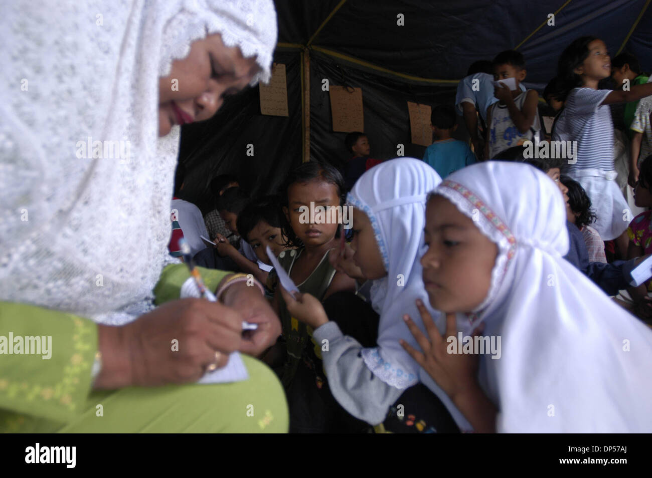 Sep 06, 2006; Banda Aceh, INDONESIA; Acehnese refugee girls join an ...