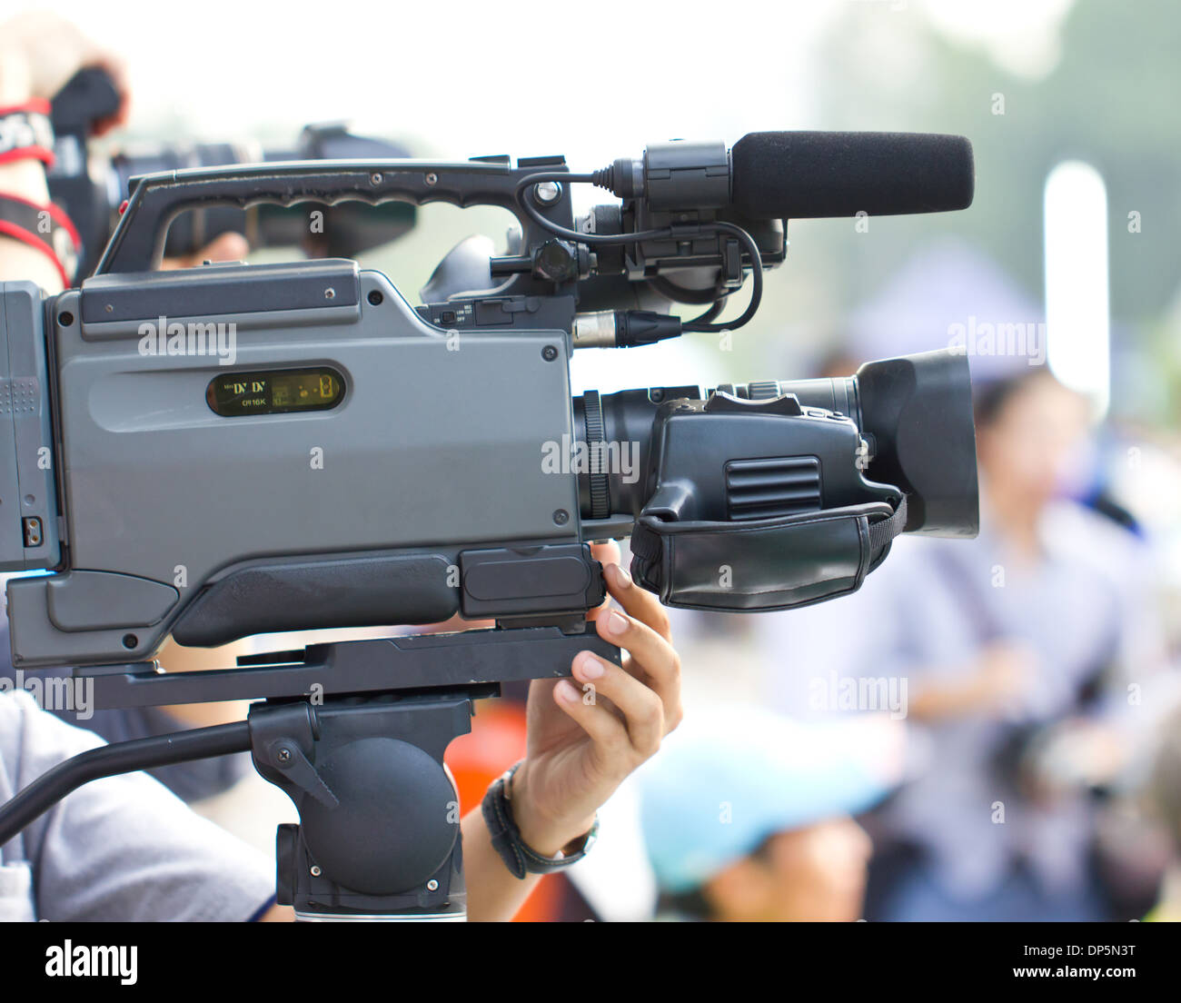 Professional news cameraman isolated hi-res stock photography and ...