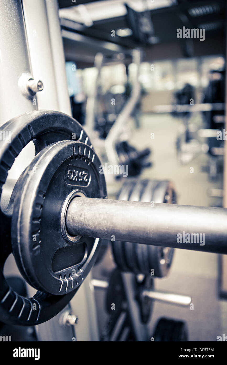 diverse equipment and machines at the gym room Stock Photo - Alamy