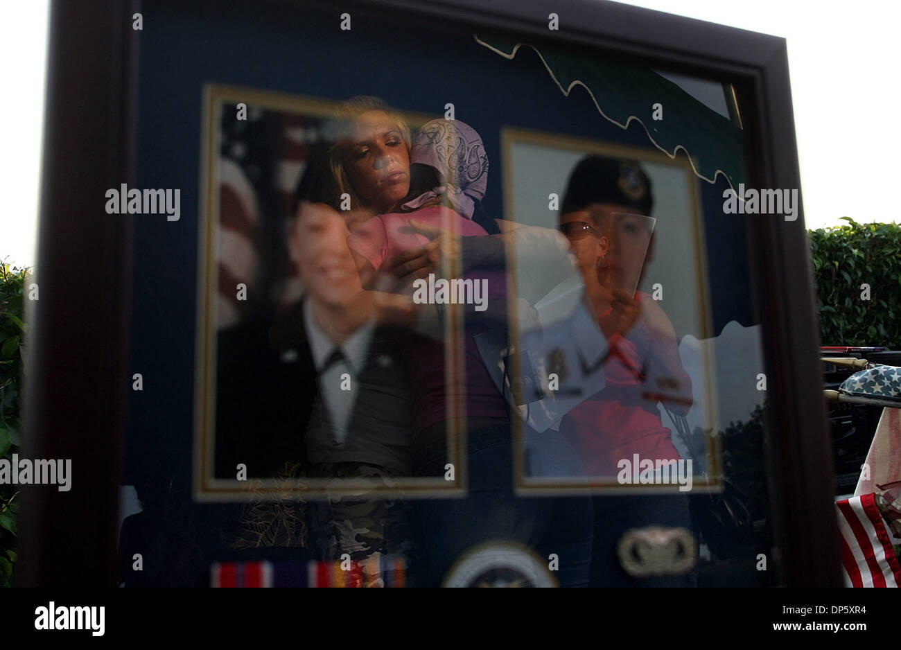 Sep 28, 2006; Pompano Beach, FL, USA; Jennifer Jacobson receives a hug ...