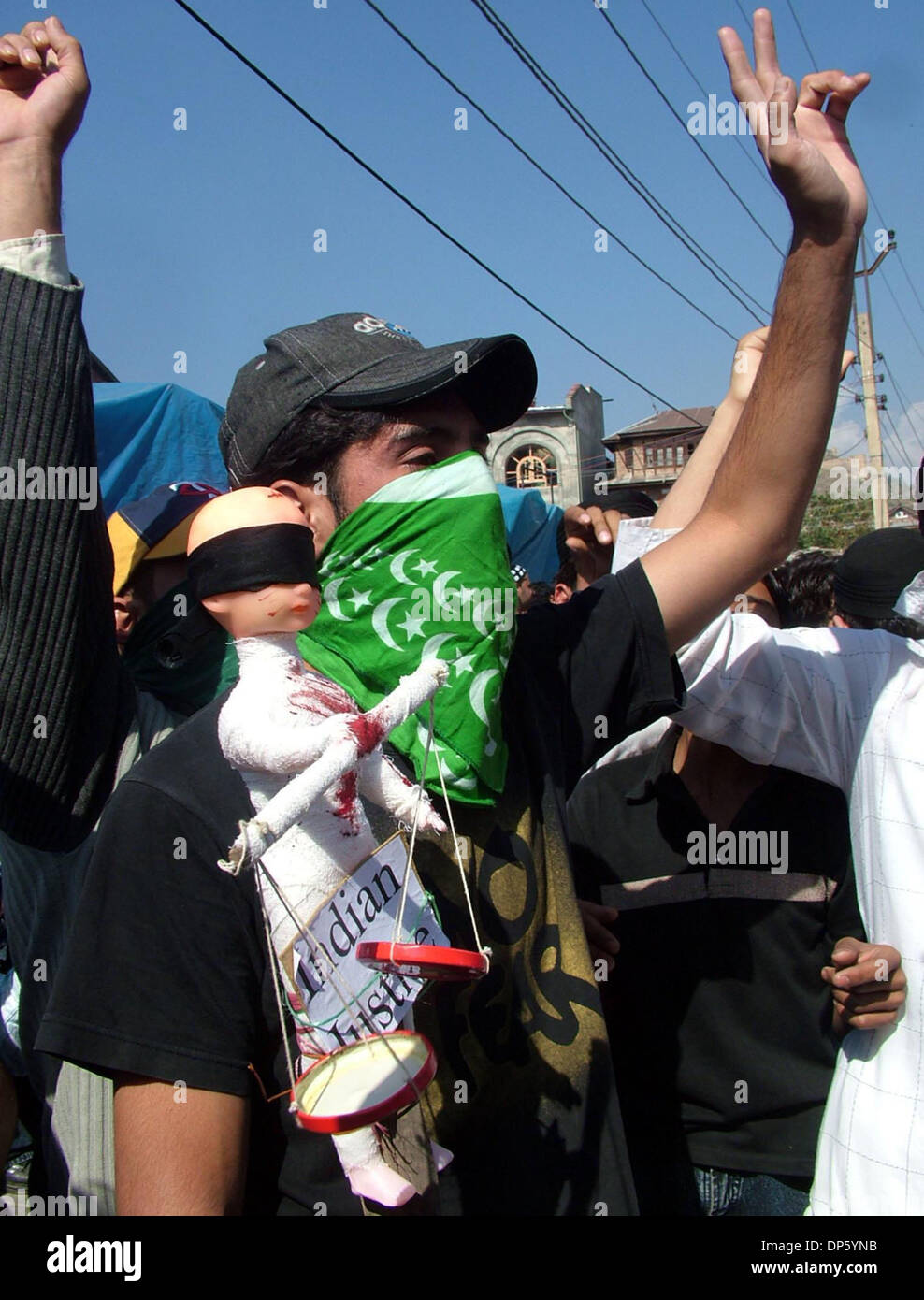Sep 29, 2006; Srinagar, Kashmir, INDIA; A Kashmiri protestor shows a ...