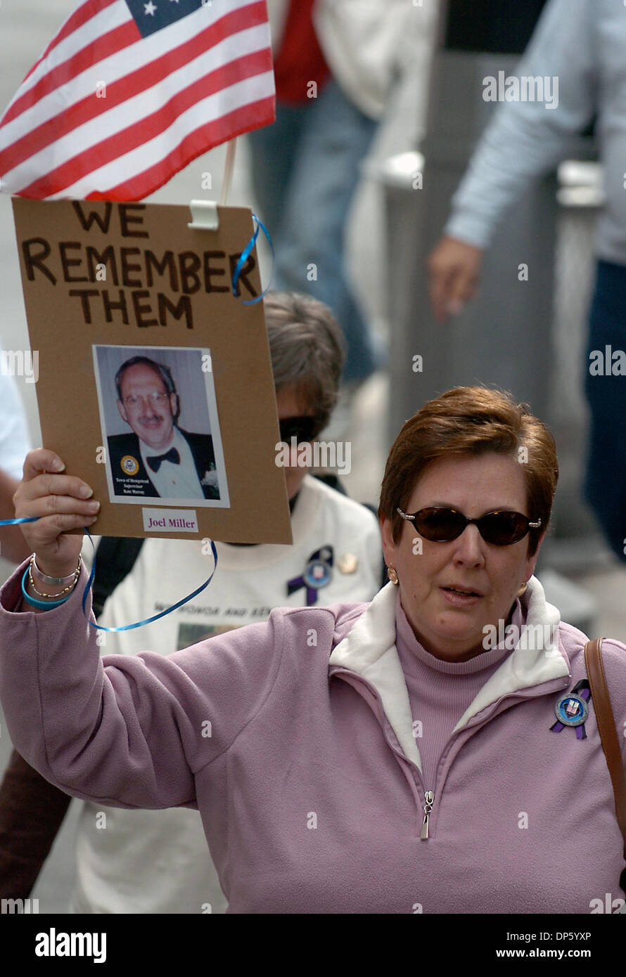 Sep 30, 2006; Manhattan, NY, USA; Margie Miller holds up a picture of ...