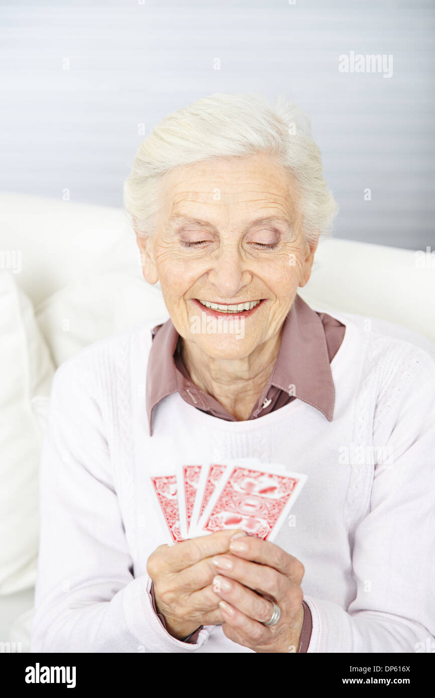 Old woman playing hi-res stock photography and images - Alamy