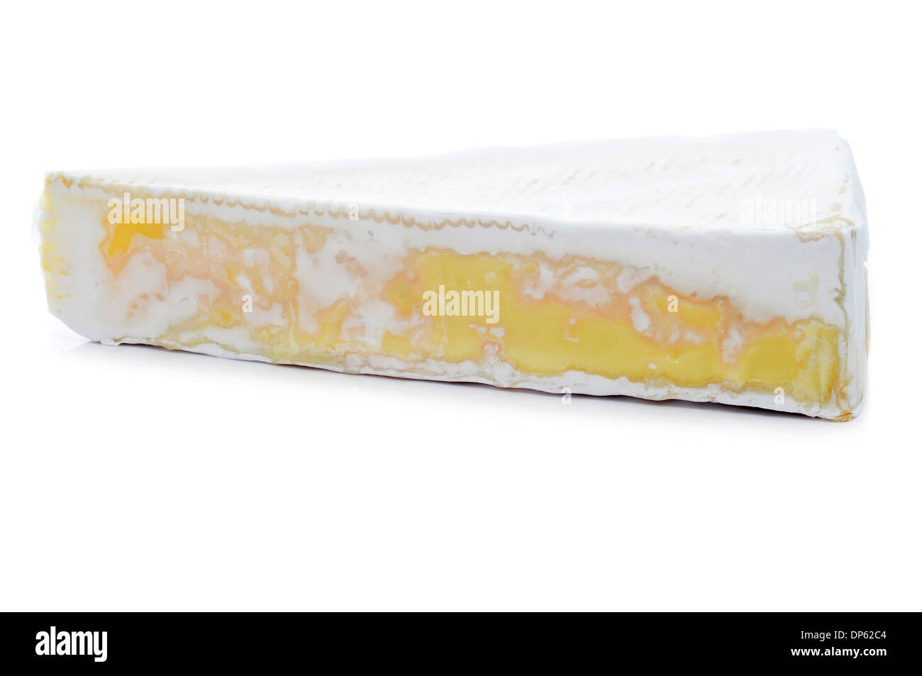 closeup of a piece of brie cheese on a white background Stock Photo - Alamy