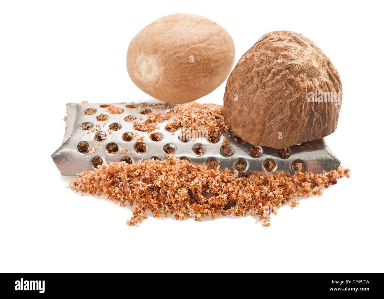 whole and grated nutmeg on white background Stock Photo - Alamy