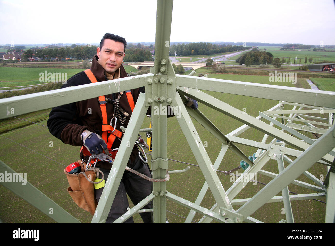 Dutch Electrical power-line repairers at work Stock Photo - Alamy