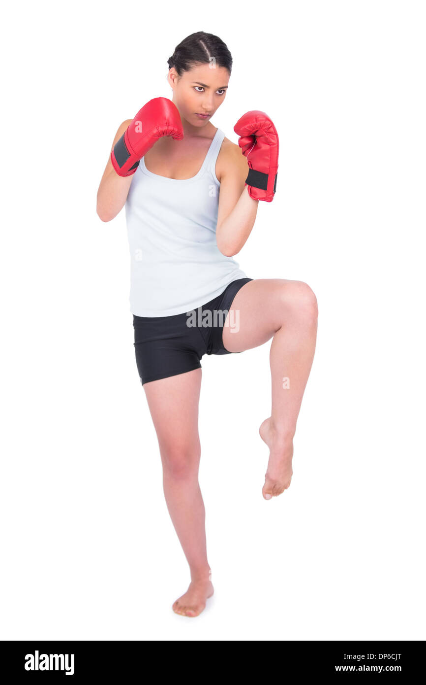 Kicking pose hi-res stock photography and images - Alamy