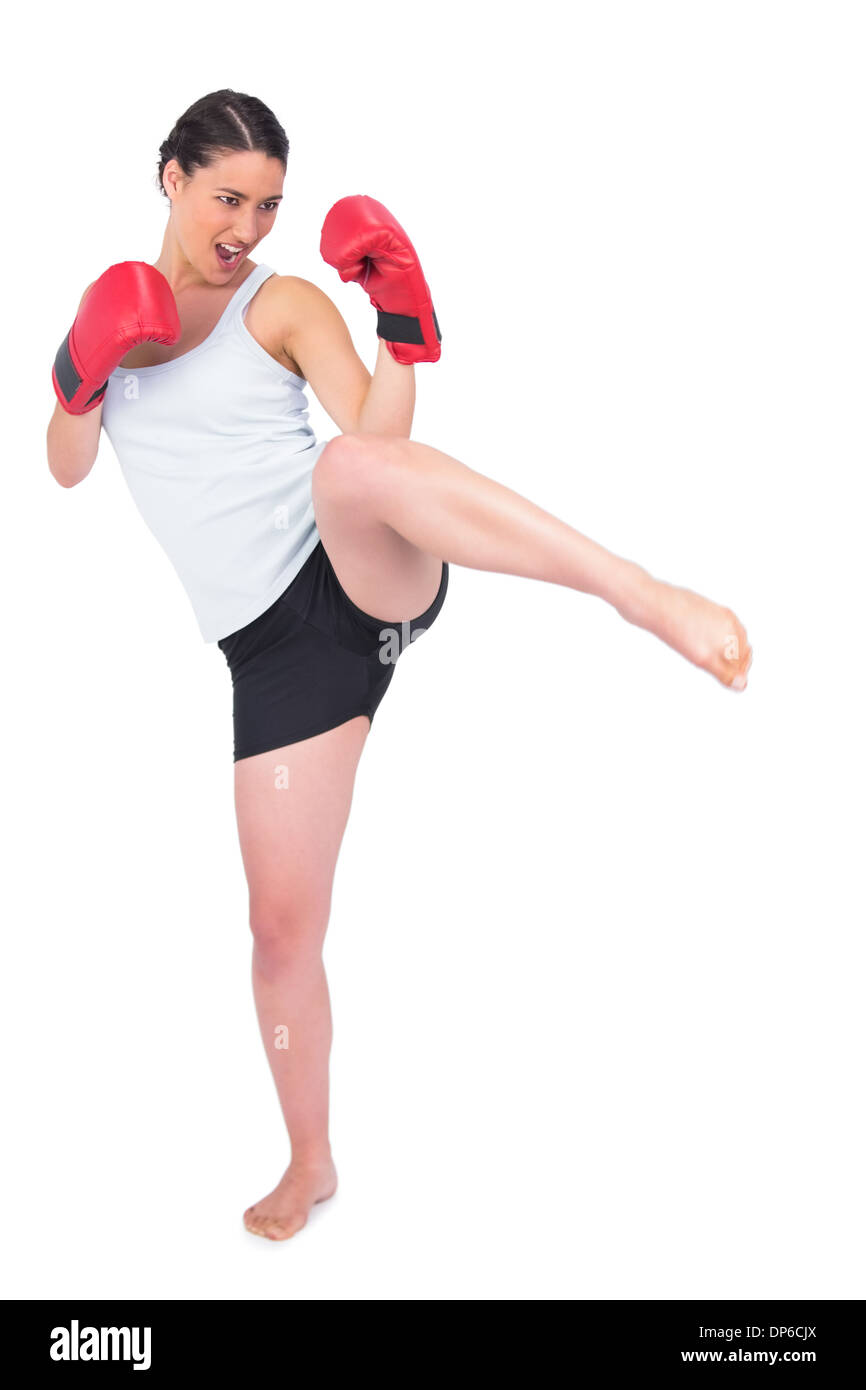 Kicking pose hi-res stock photography and images - Alamy