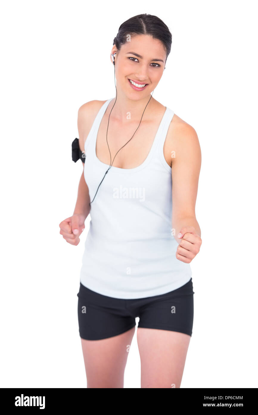 Smiling slender model jogging Stock Photo - Alamy