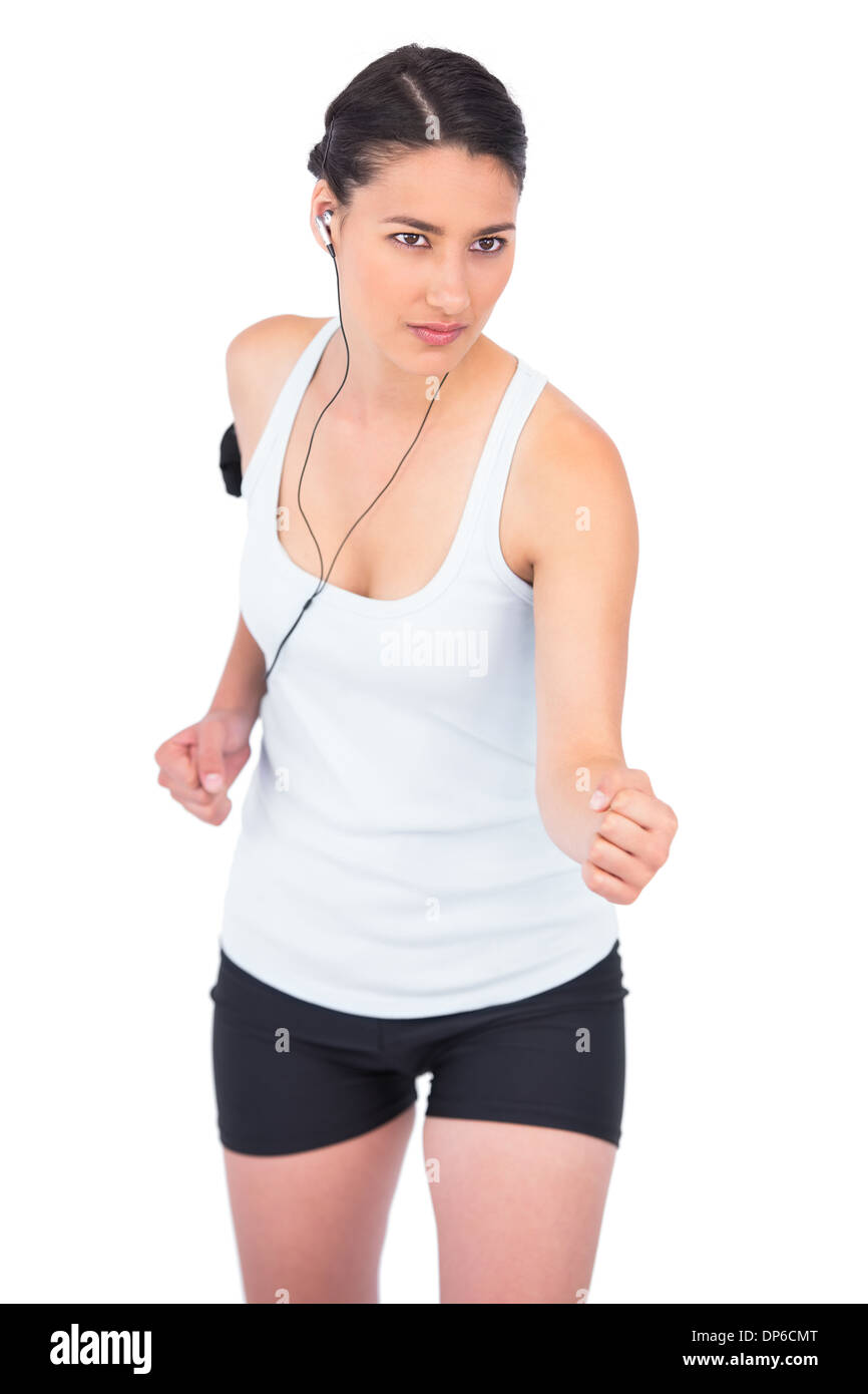 Serious fit model jogging Stock Photo - Alamy