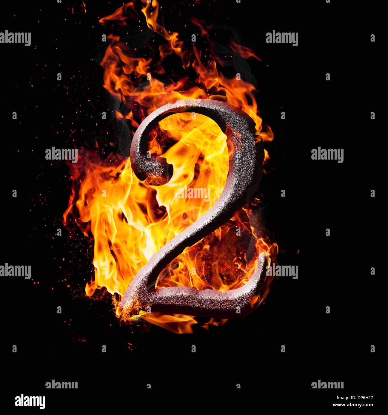 Hot metal burning numbers on black background Stock Photo - Alamy