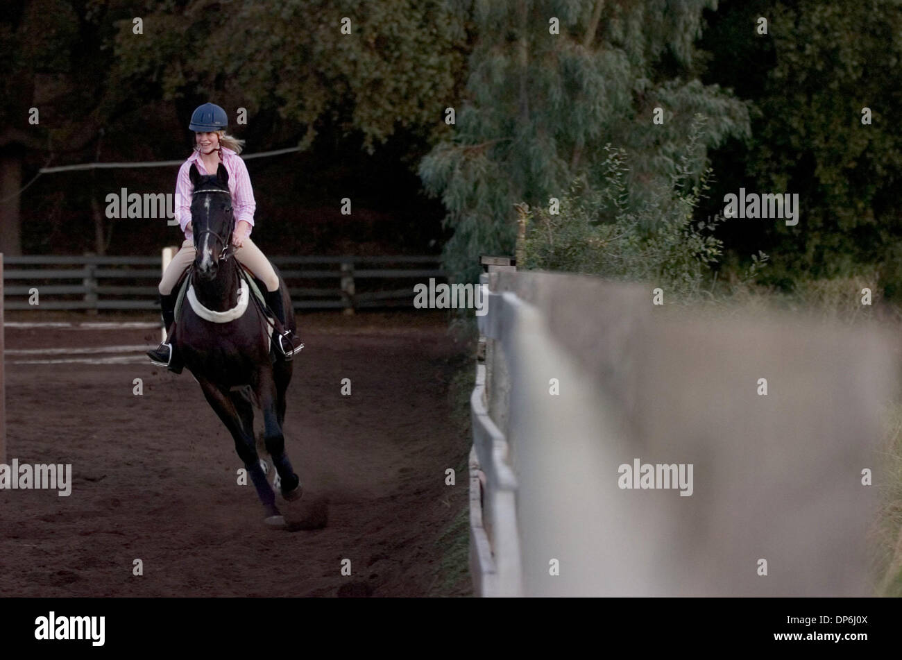 Oct 12, 2006; Sacramento, CA, USA; JULIA WILSON excercises her horse ...