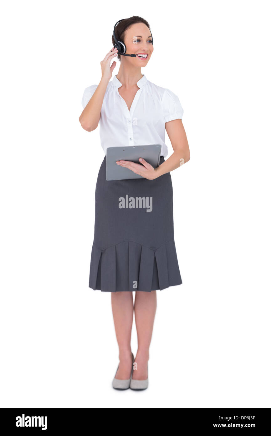 Cheerful call center agent holding clipboard Stock Photo - Alamy