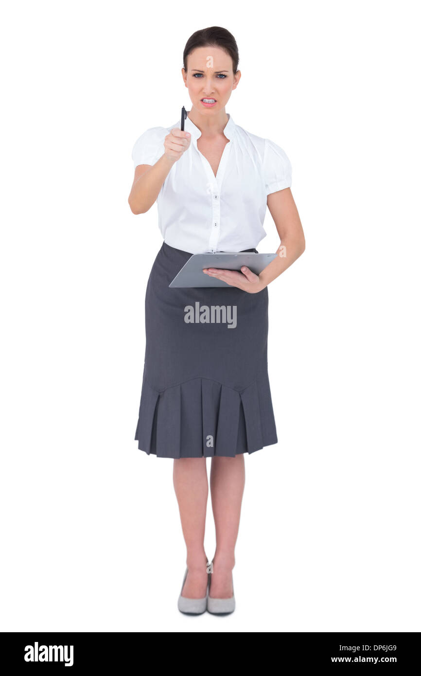 Nervous businesswoman pointing at camera Stock Photo - Alamy