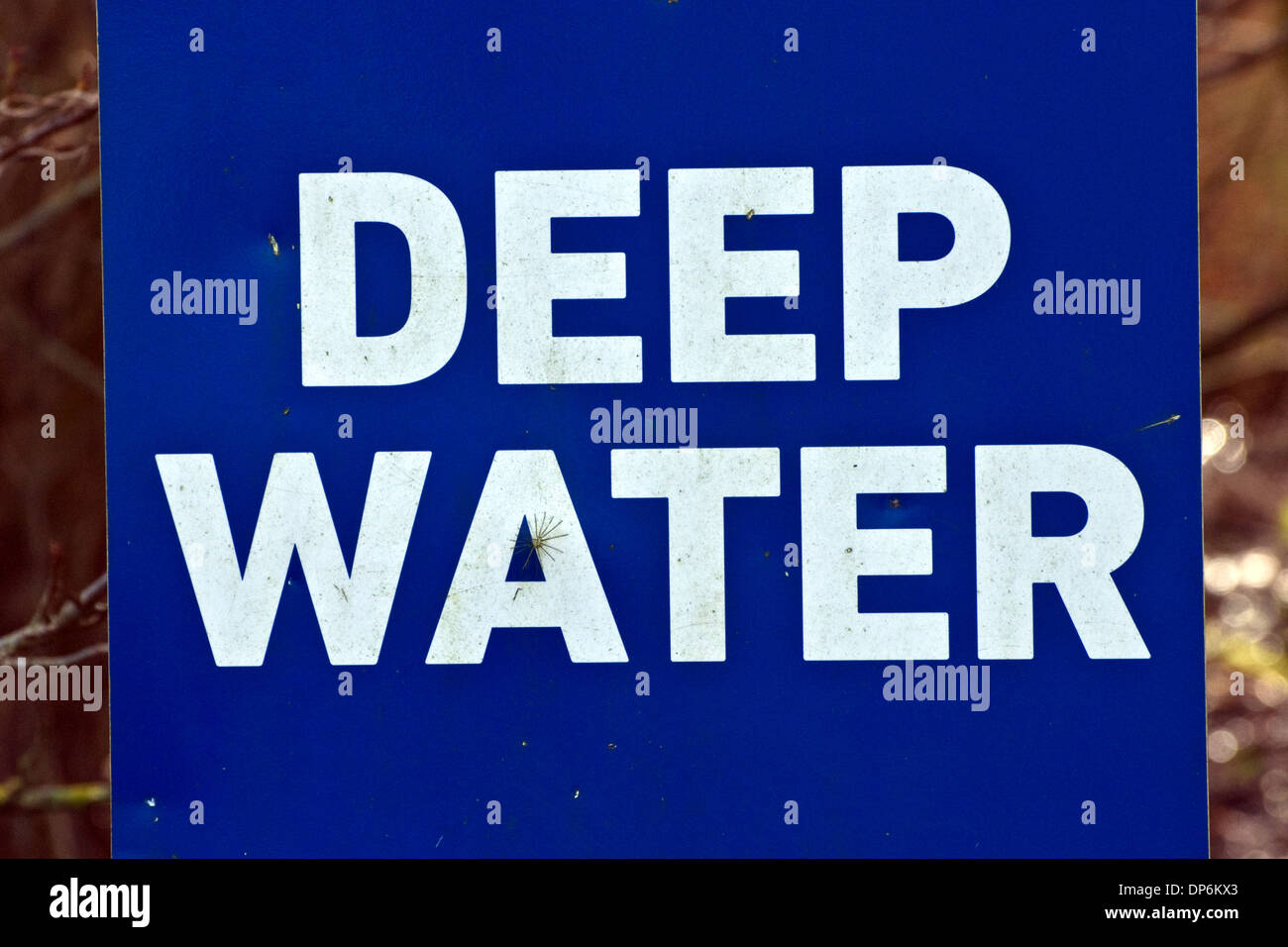Sign warning of deep water Stock Photo - Alamy