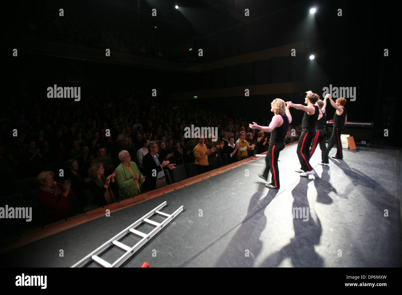 Stage Actors performing in a theater Stock Photo - Alamy