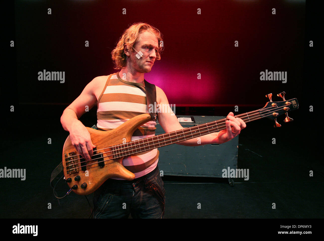 Stage Actors performing in a theater Stock Photo - Alamy