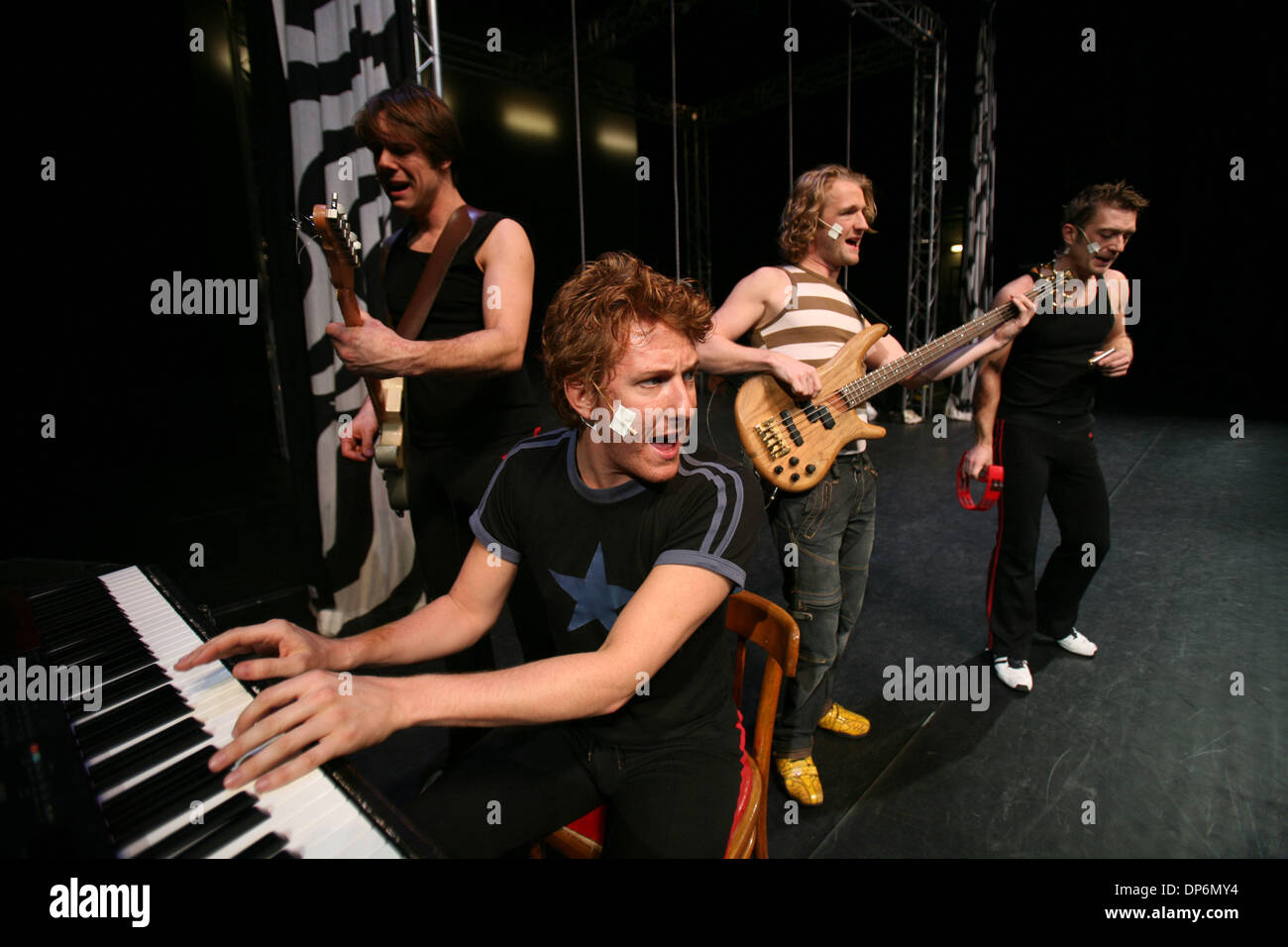 Stage Actors performing in a theater Stock Photo - Alamy