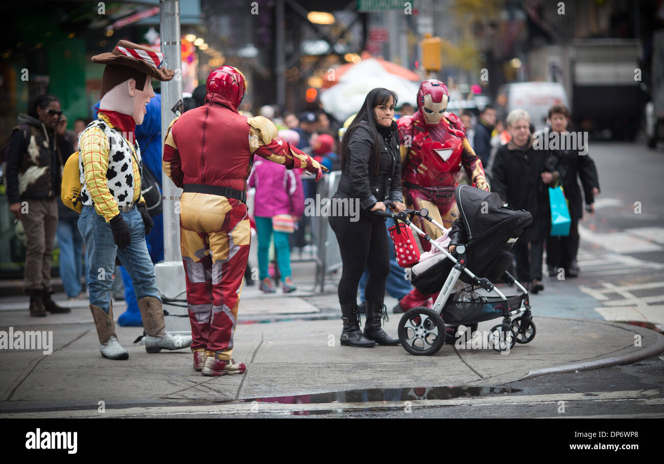 Superhero caricatures in Times Square New York busking for cash Stock ...