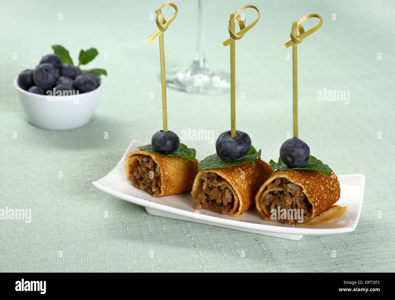 Pancake roll stuffed with minced meat, close up Stock Photo - Alamy