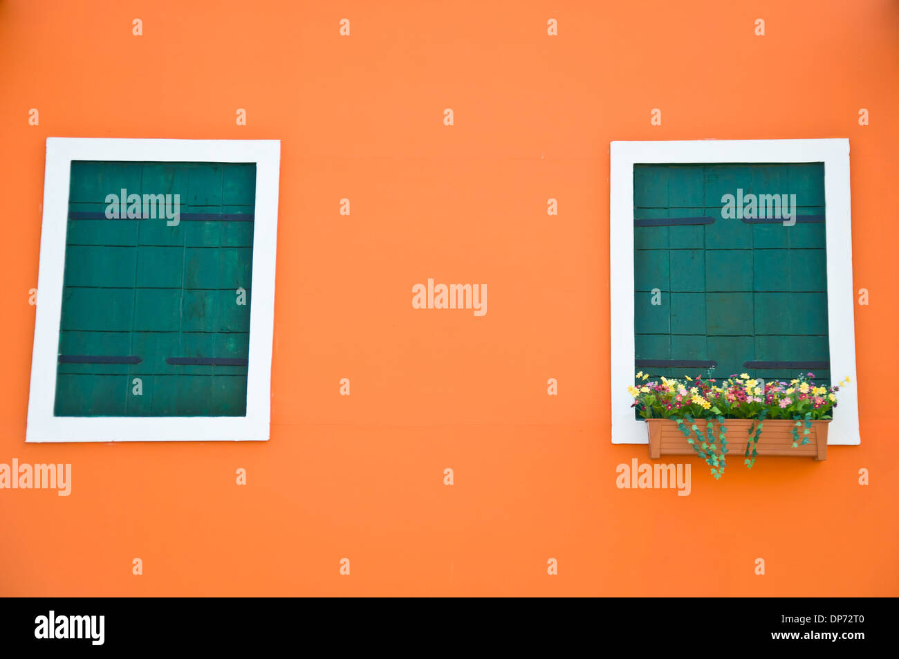 green window on orange wall Stock Photo - Alamy
