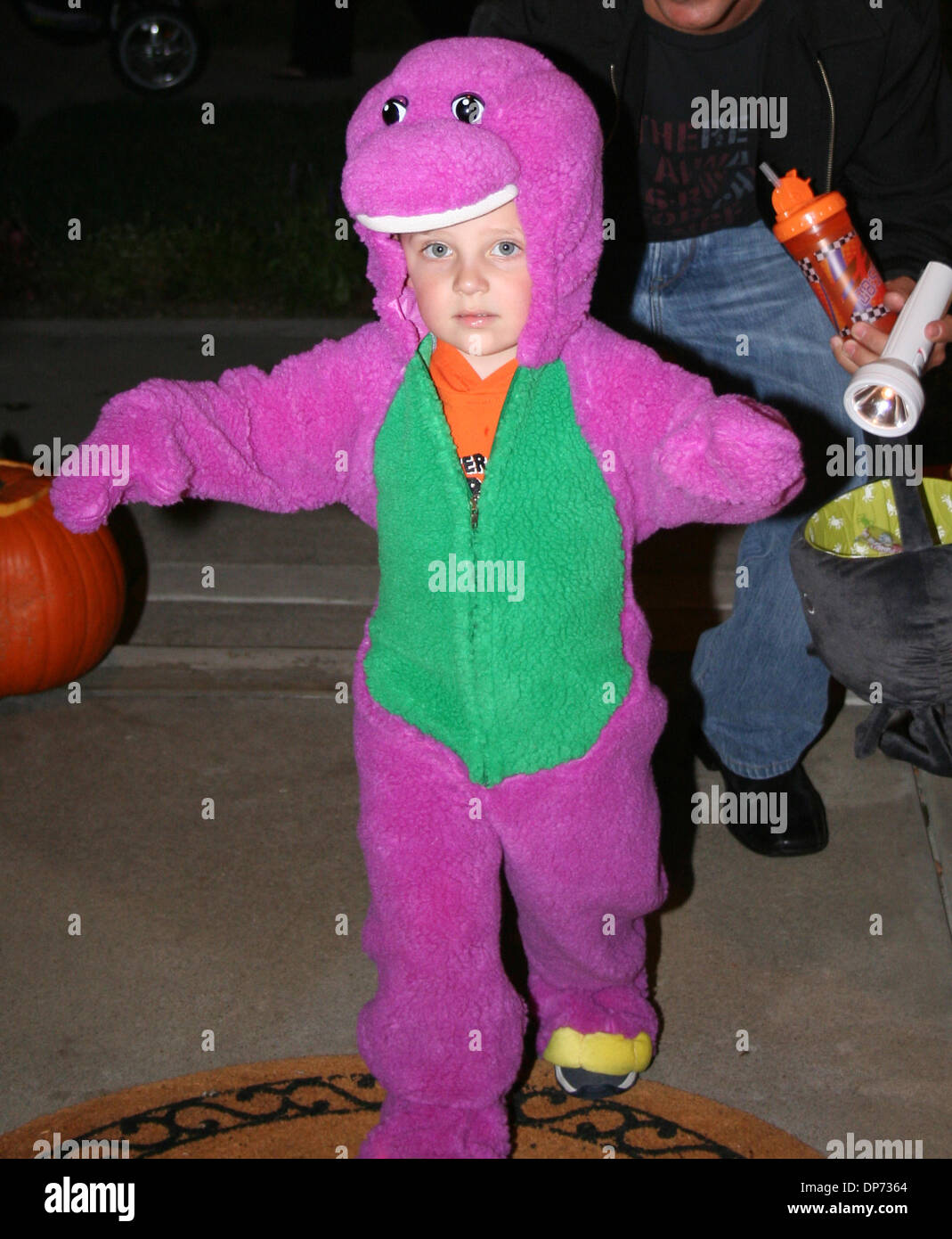 Oct 31, 2006; Newport Beach, CA, USA; A young boy dressed as Barney ...