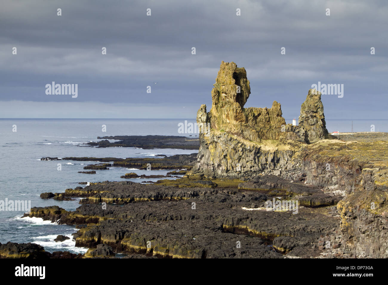 View of lava cliffs and coastline, near Hellnar, Snaefellsness ...