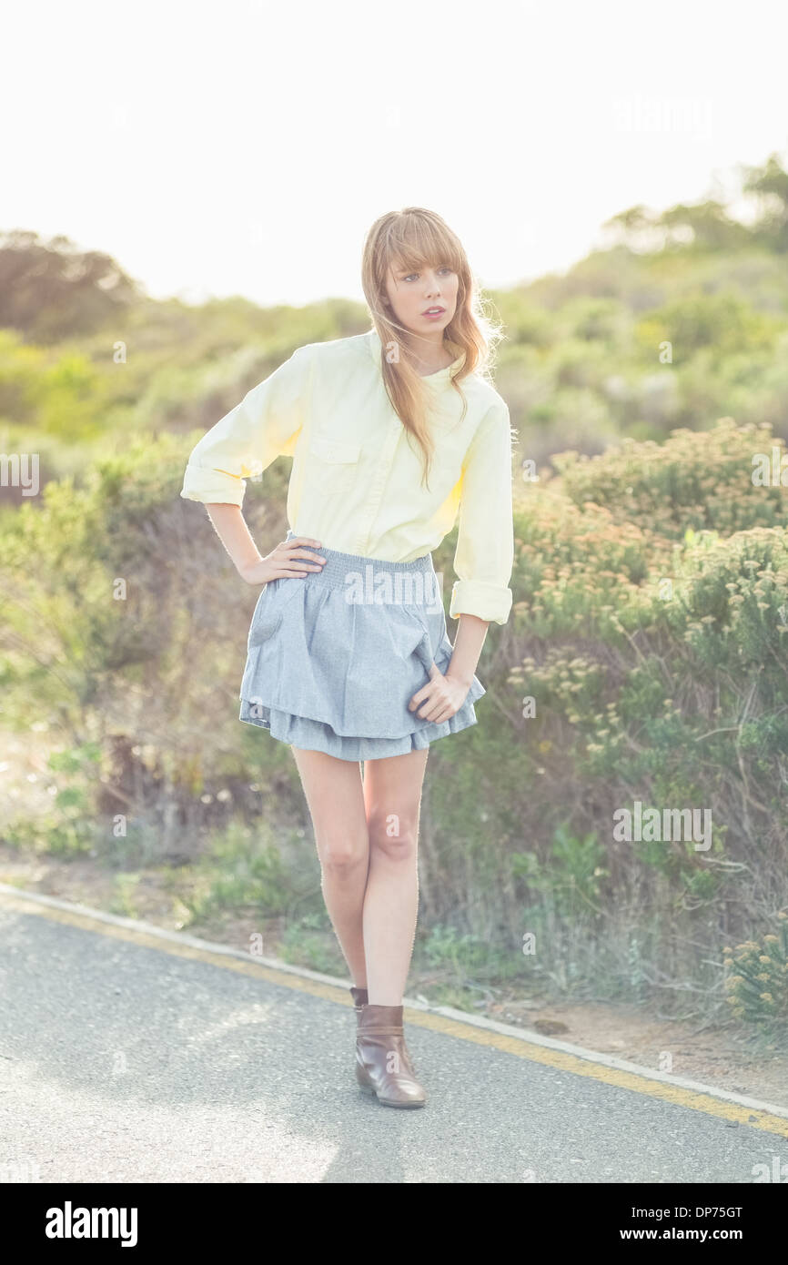 Gorgeous blonde woman on the roadside Stock Photo - Alamy