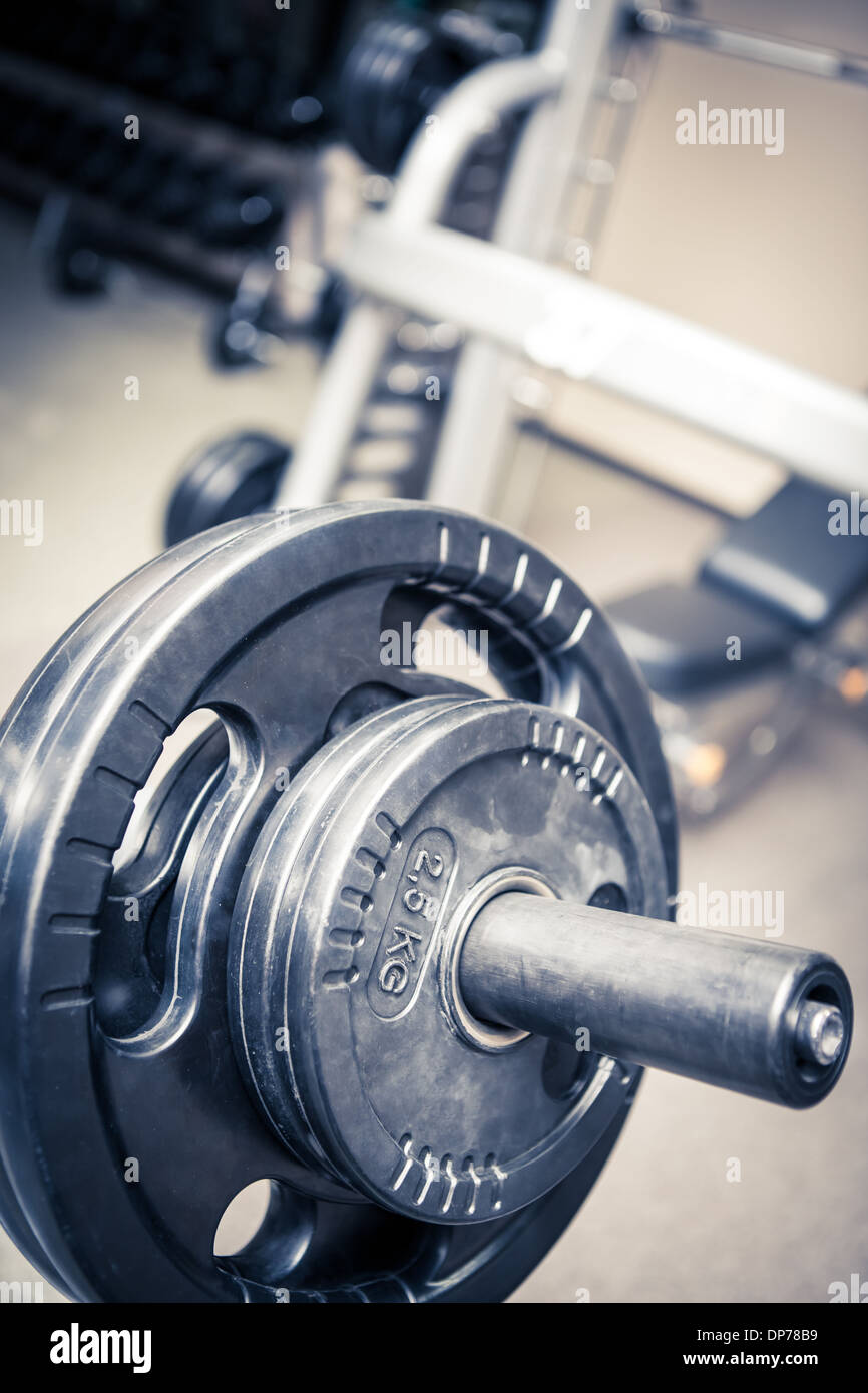 diverse equipment and machines at the gym room Stock Photo - Alamy