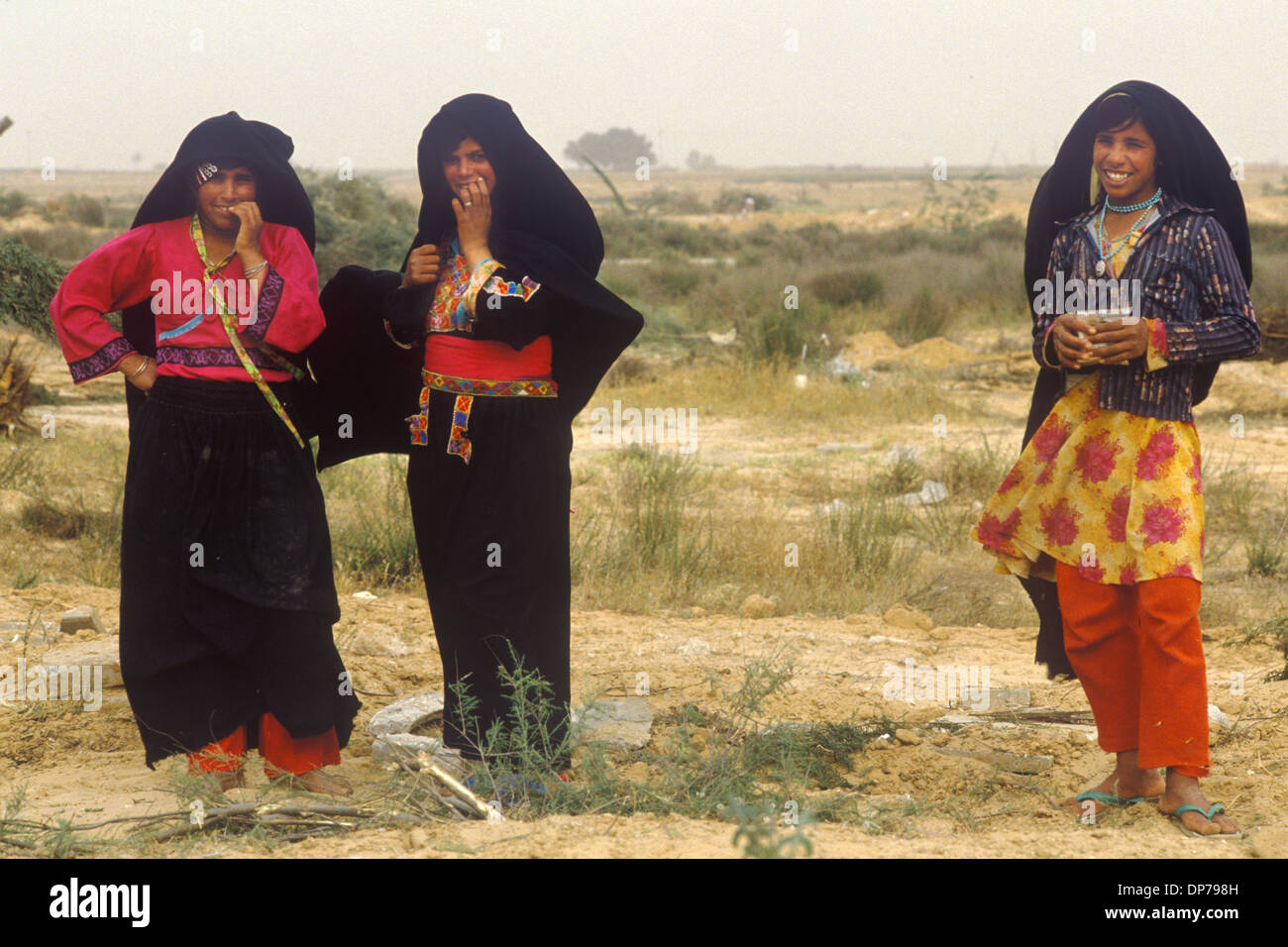 Bedouin indigenous women in traditional cloths. They are at the former ...