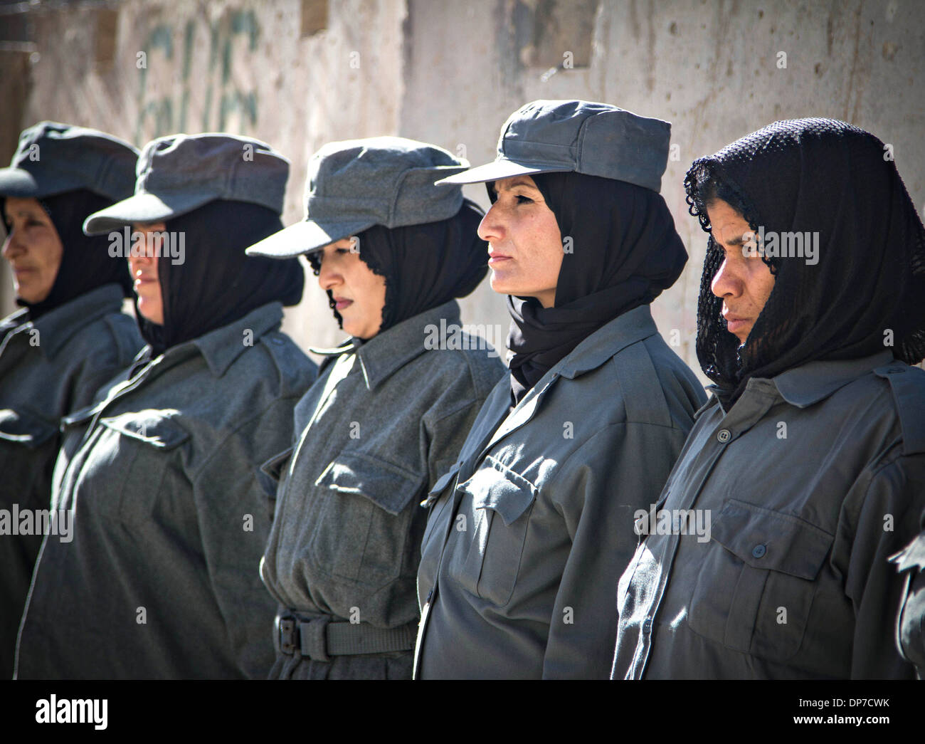 Woman Afghan National Police recruits wearing head covering stand at ...