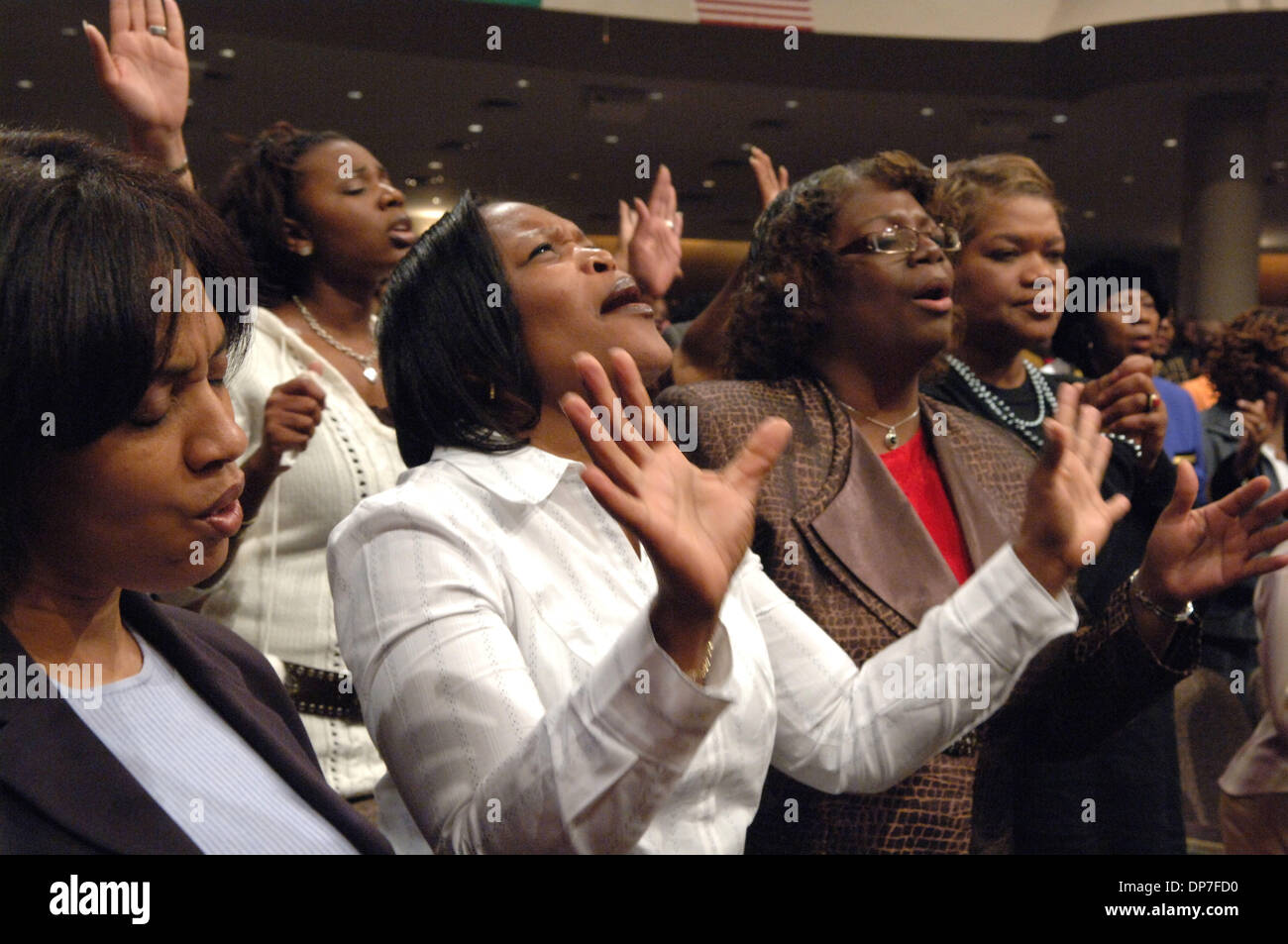 Nov 15, 2006; Atlanta, GA, USA; The faithful worship with their hands ...