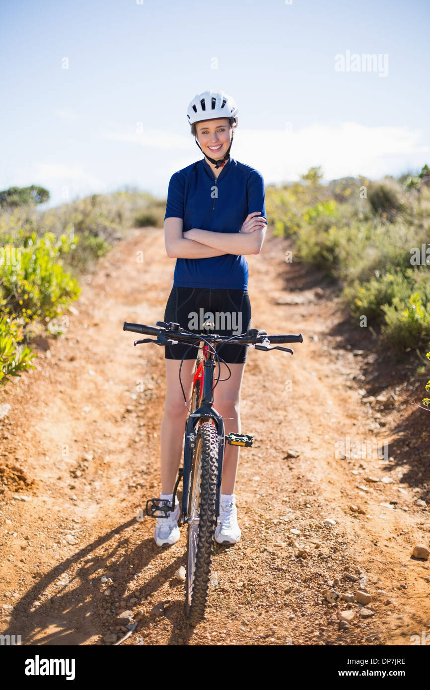 Biker with crossed arms helmet hi-res stock photography and images - Alamy
