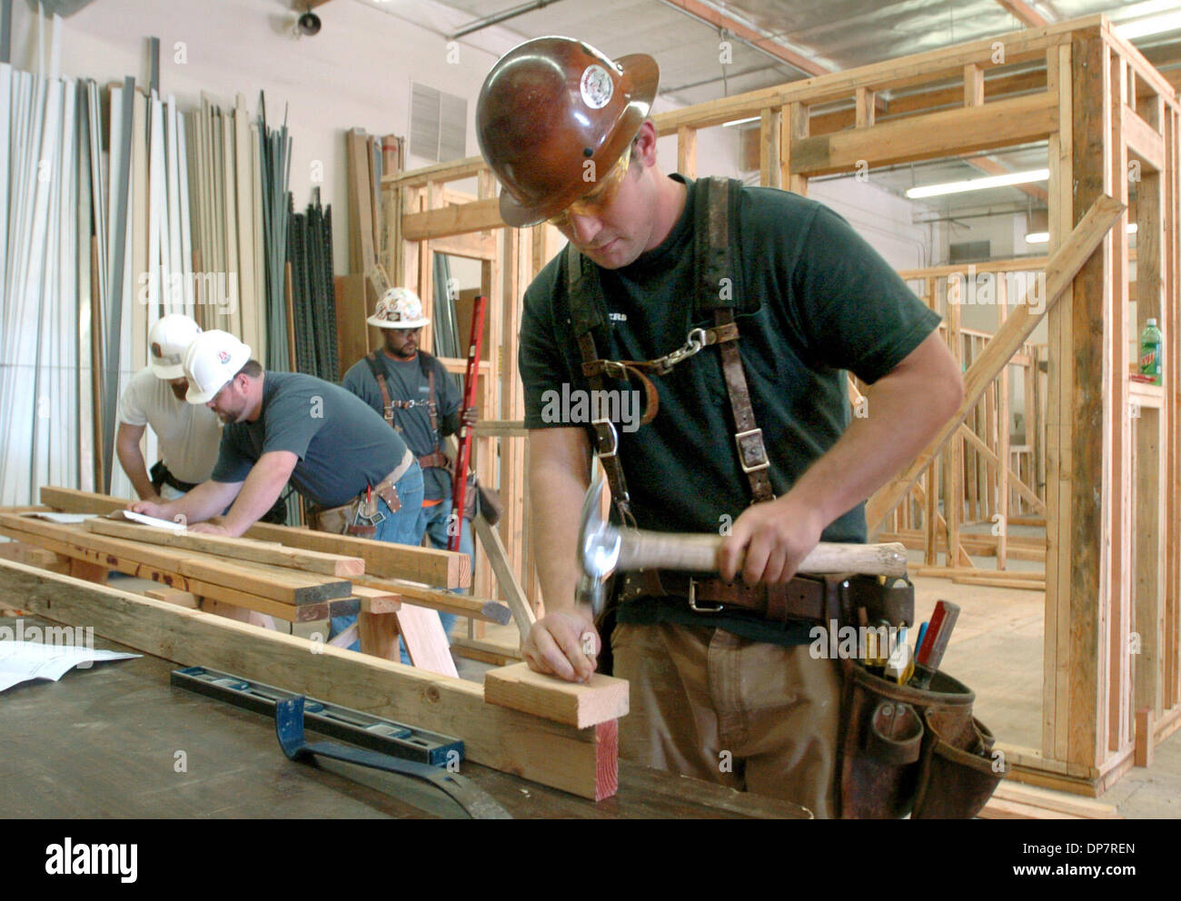 Nov 08, 2006; Pleasanton, CA, USA; Jack Anderson helps frame a ...