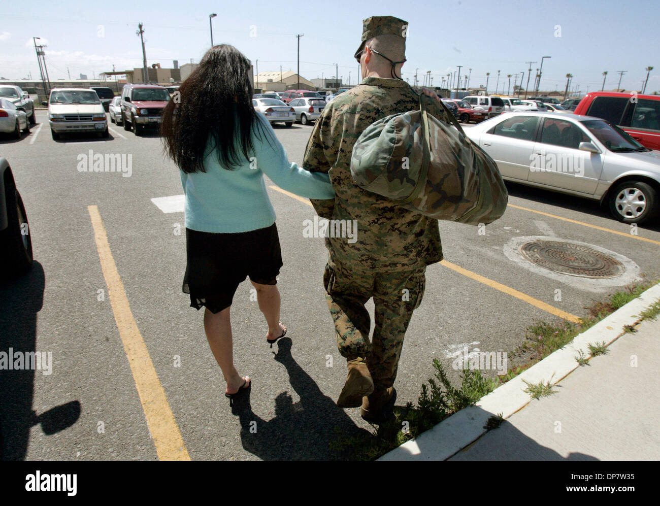Apr 06, 2006; Camp Pendleton, CA, USA; TONIA SARGENT, left, helps her ...