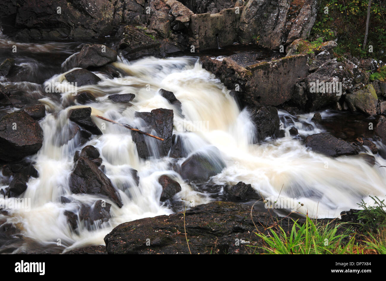 A view of small waterfalls in the River Muick near Ballater ...