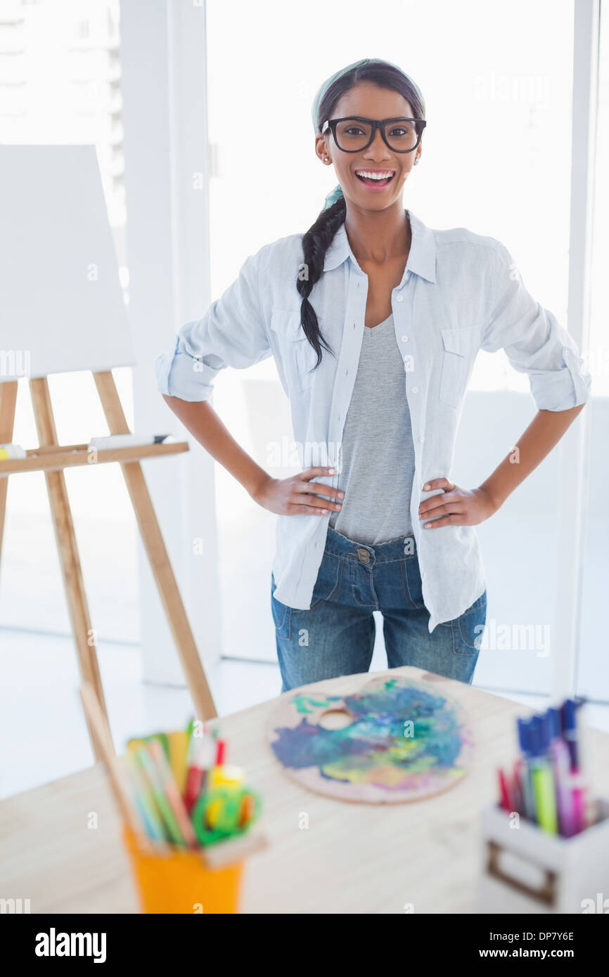 Cheerful pretty artist posing Stock Photo - Alamy