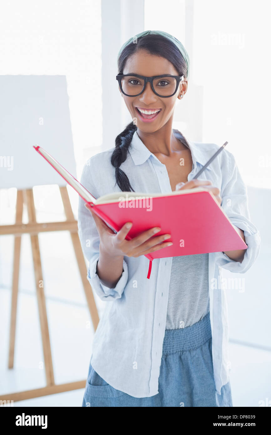 Cheerful attractive artist writing hi-res stock photography and images ...