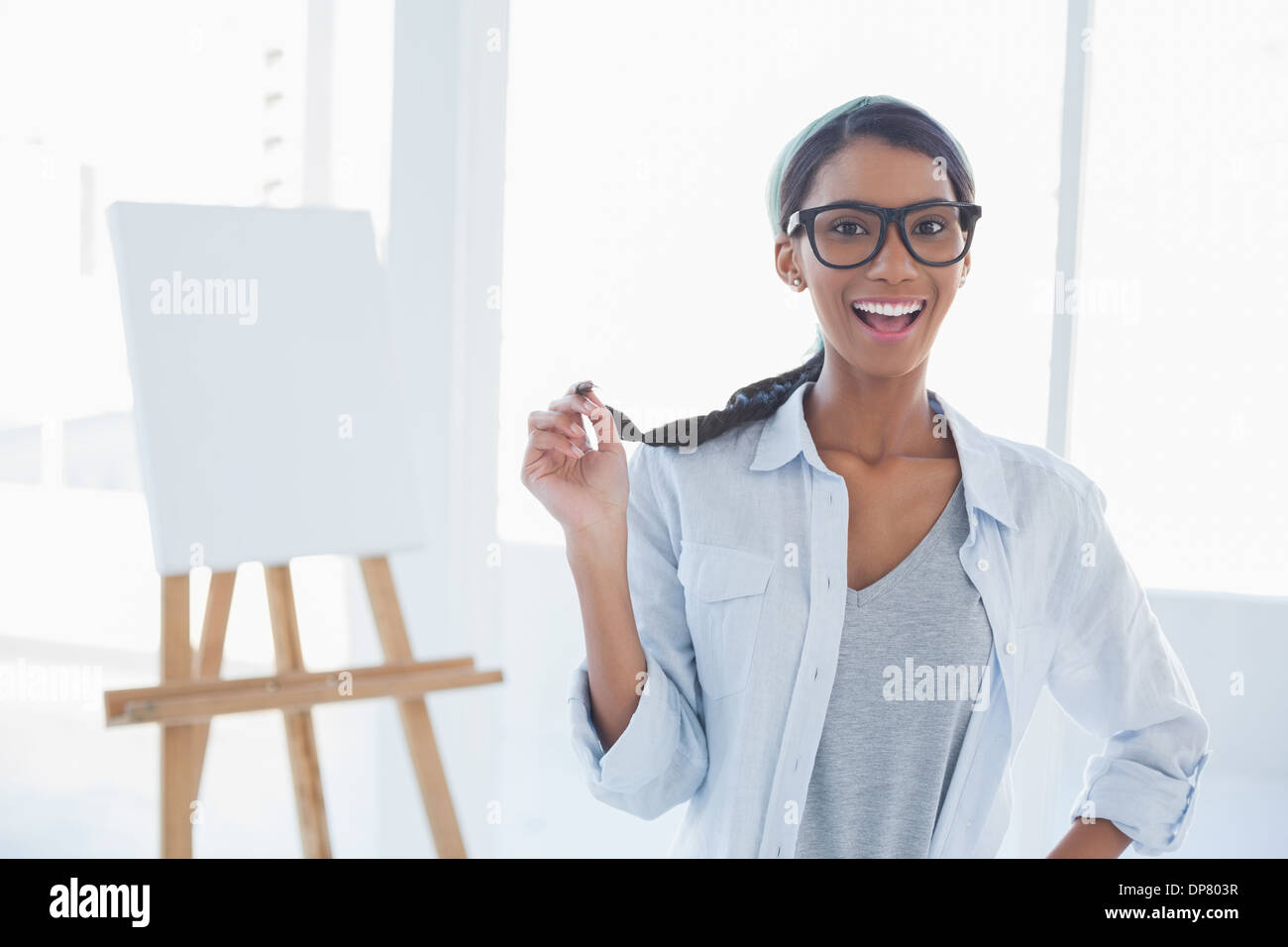 Smiling attractive artist posing Stock Photo - Alamy