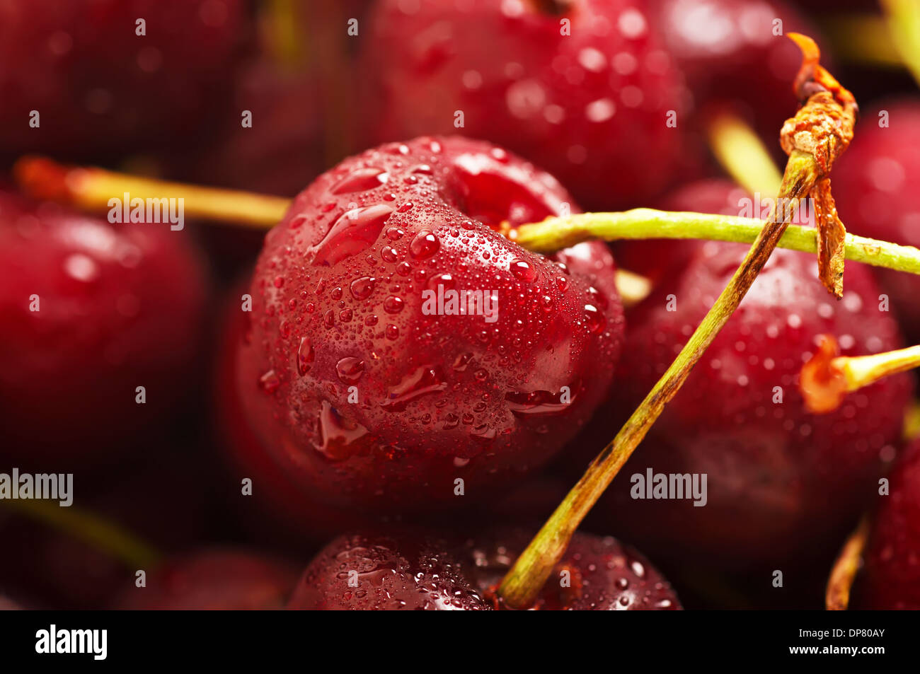 Sweet cherry background Stock Photo - Alamy