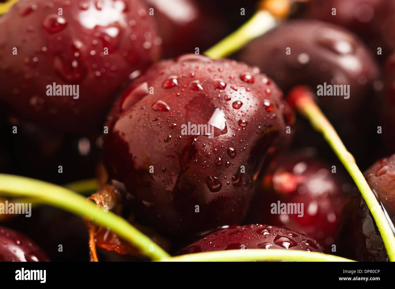 Sweet cherry background Stock Photo - Alamy