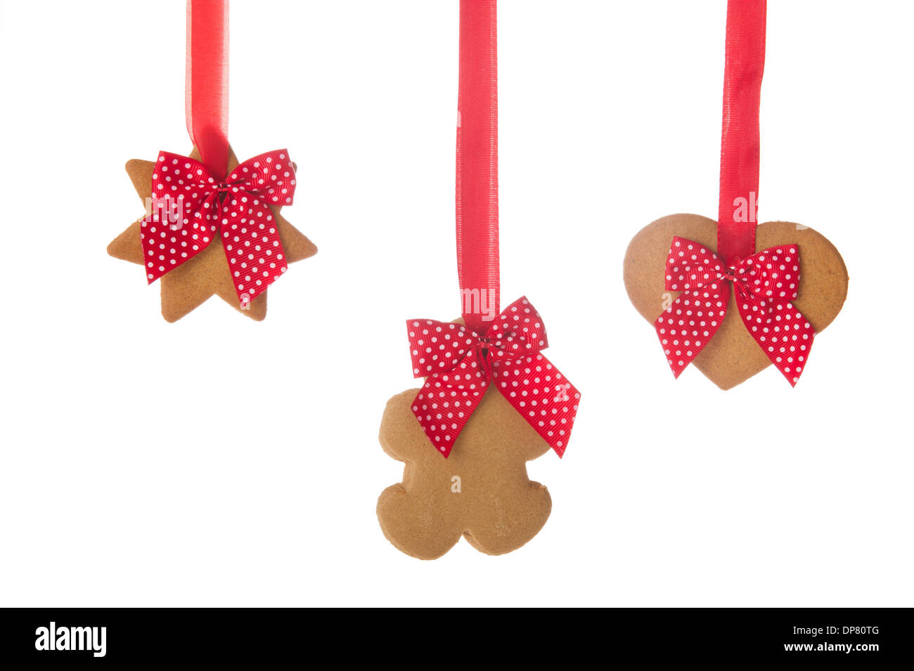 Hanging Christmas ginger bread cookies with ribbons and bows Stock ...